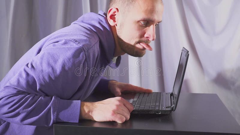 Man licking laptop. stock footage. Video of monitor - 133322094