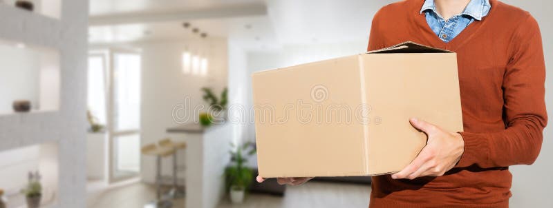 Man Lifting Cardboard Boxes in Apartment Interior. Stock Image - Image ...