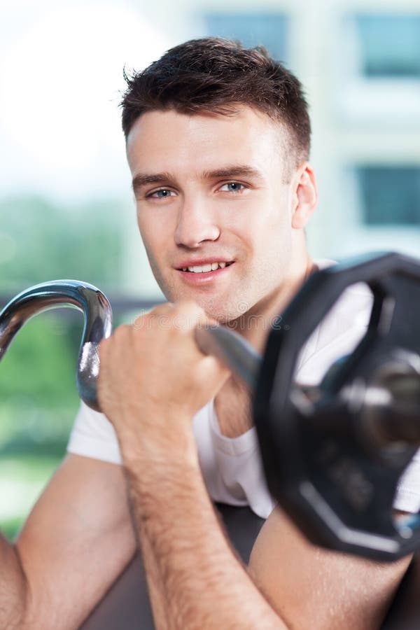 Man Lifting Weights stock image. Image of healthy, strength - 25962443