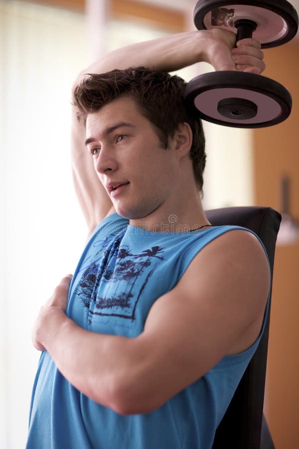 Man lifting weights stock image. Image of weights, equipment - 53755451