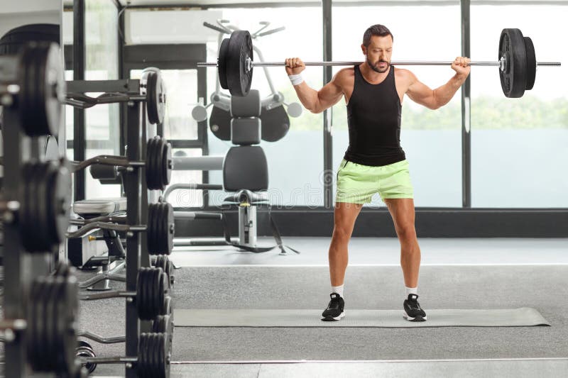 Man lifting weights stock image. Image of shape, body - 344644873