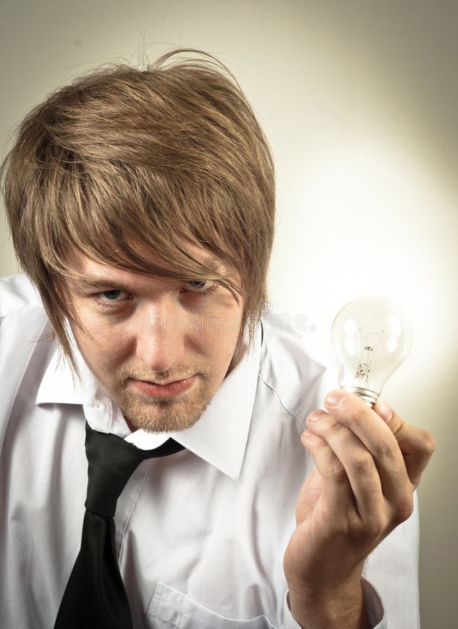 Man and light bulb stock image. Image of expressions - 23621787