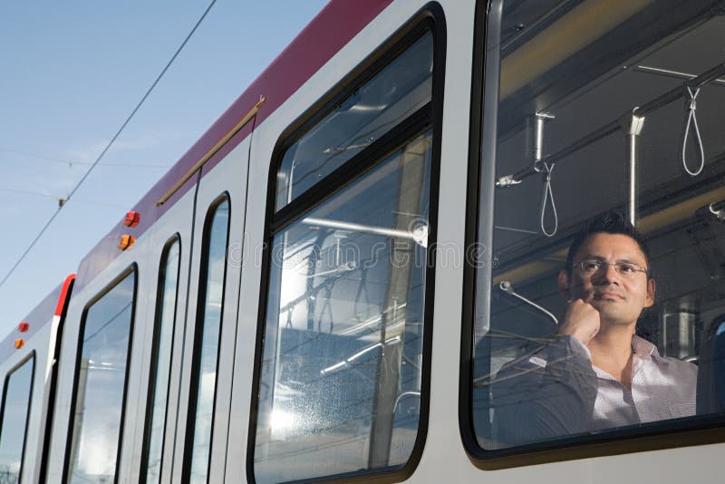 Man on light rail stock photo. Image of compartment, american - 62807554