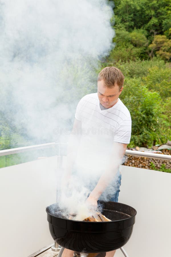 Man is Lighting the Fire for Bbq Stock Image - Image of smoker ...