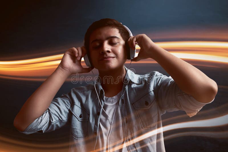 Man listening music stock image. Image of indonesian - 86064487