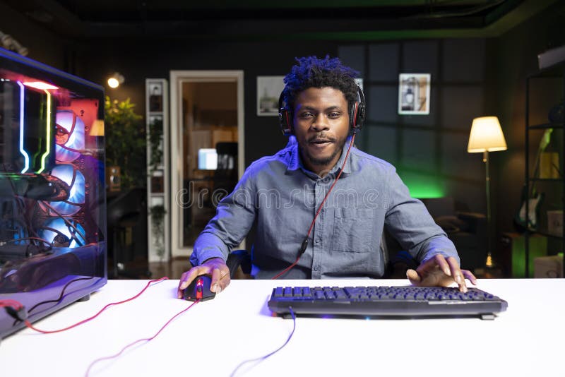 Man Live Streaming To Audience, Using High Tech Computer Peripherals To ...