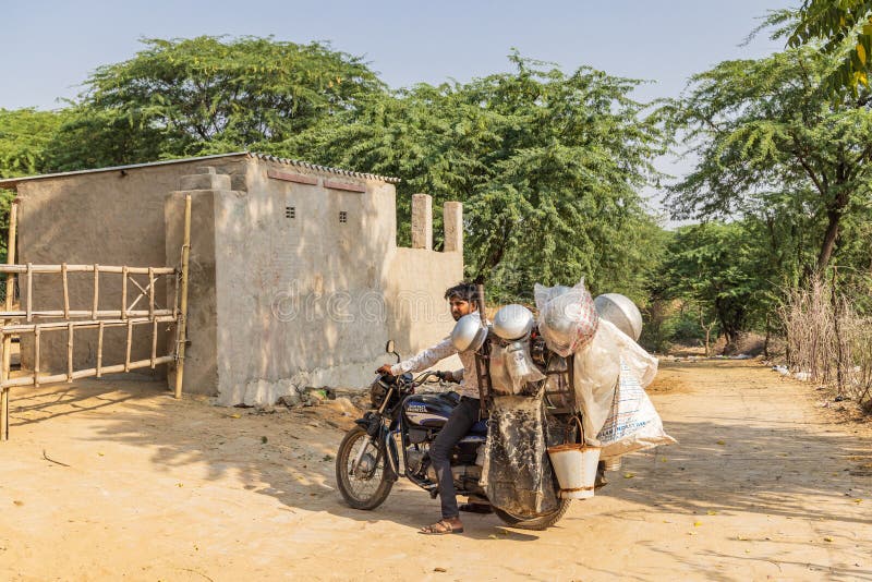 Man on a loaded motorcycle editorial photography. Image of alone ...