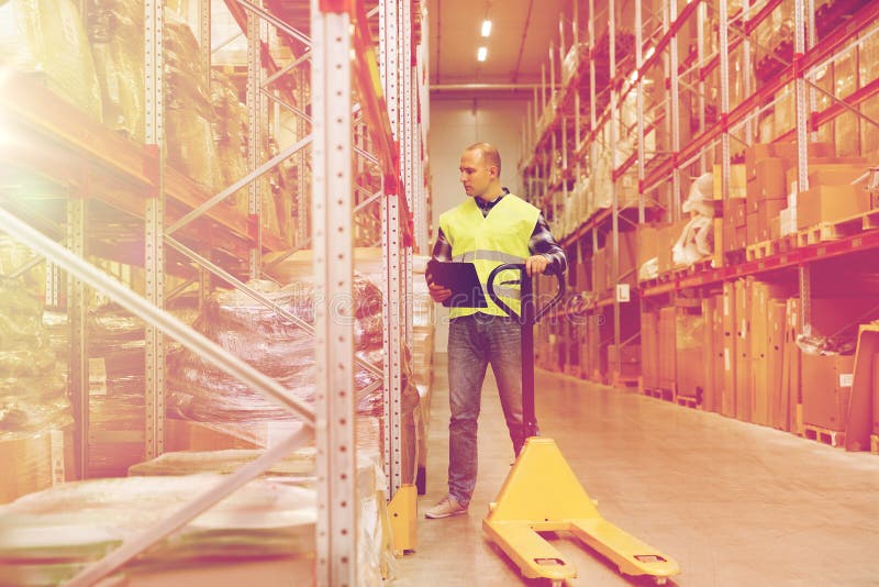 Man with Loader and Clipboard at Warehouse Stock Image - Image of ...