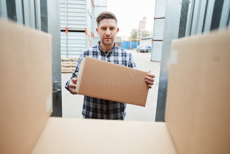 Man Loading Container with Boxes Stock Image - Image of warehouse ...