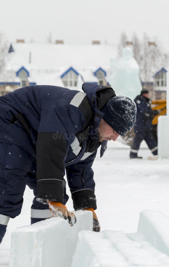 A Worker Loads Ice Blocks Onto a Sled Stock Image - Image of hand ...