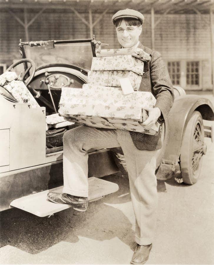 Man Loading Presents into His Car Stock Image - Image of decoration ...