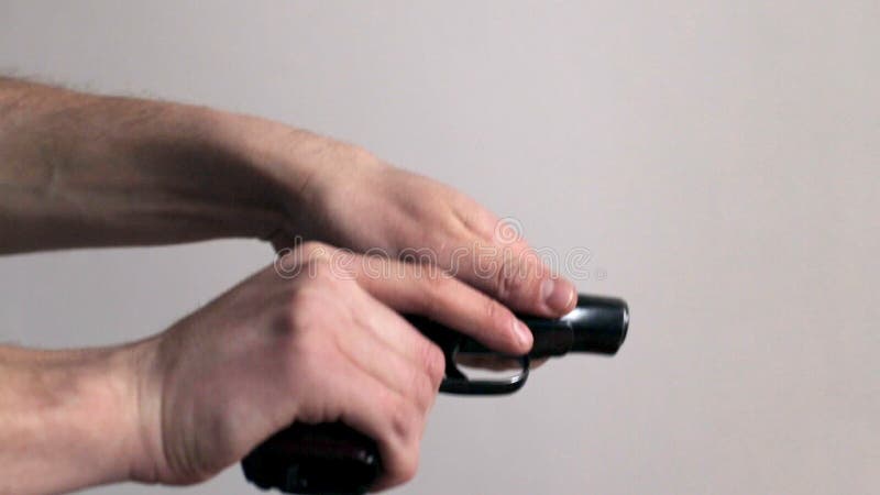 Killer Reloading Revolver Sitting in Ambush Waiting for Victim ...