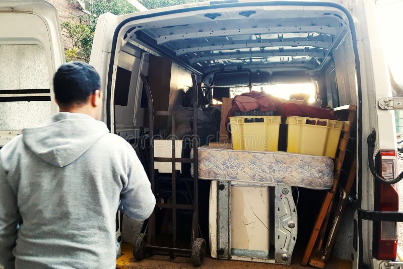 Man loading a van stock photo. Image of adult, male - 143732656