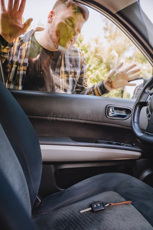 Man Locked Car and Forget Keys Inside Stock Photo - Image of keys ...