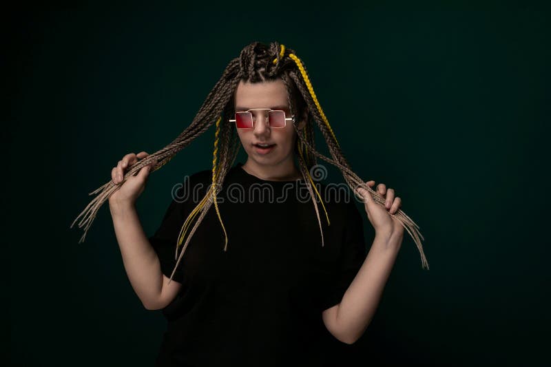 A Man with Long Dreadlocks and Red Glasses Stock Photo - Image of ...