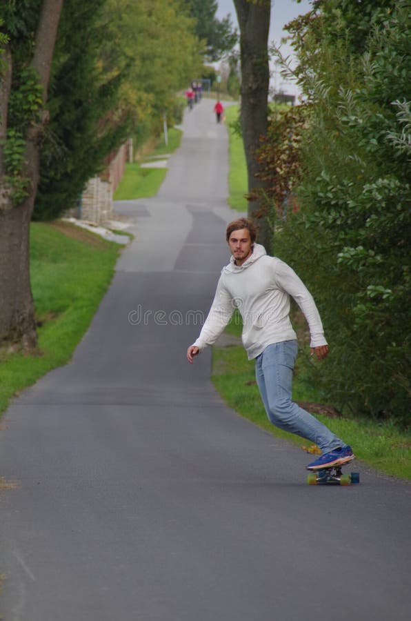 Man longboarding stock image. Image of lean, countryside - 72354689