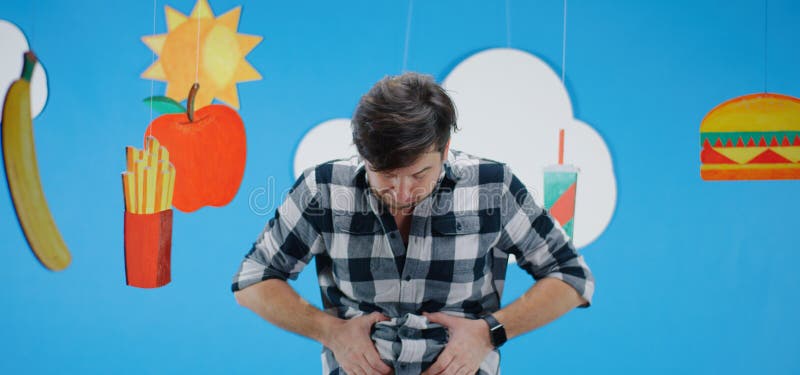 Man longing for fast food stock photo. Image of indoors - 173342454