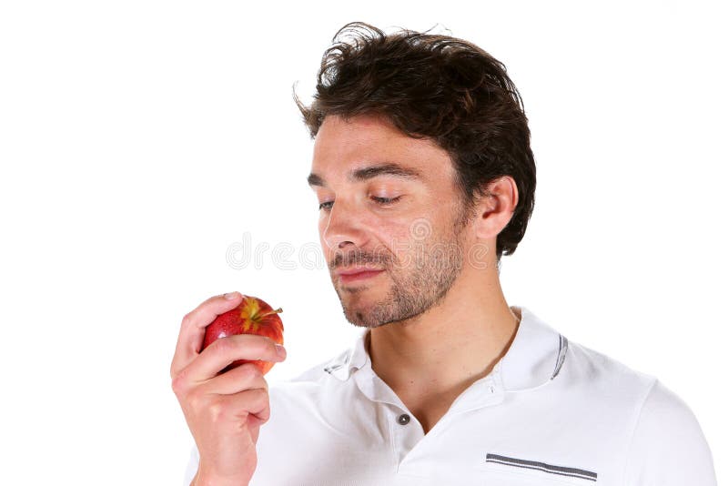 Man looking an apple stock image. Image of charming, summer - 34037175