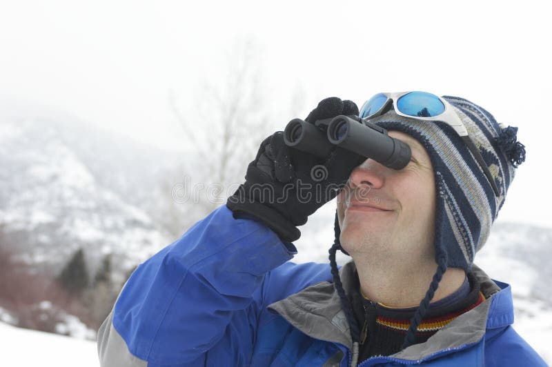 Man Looking through Binoculars Stock Image - Image of adult, clothing ...