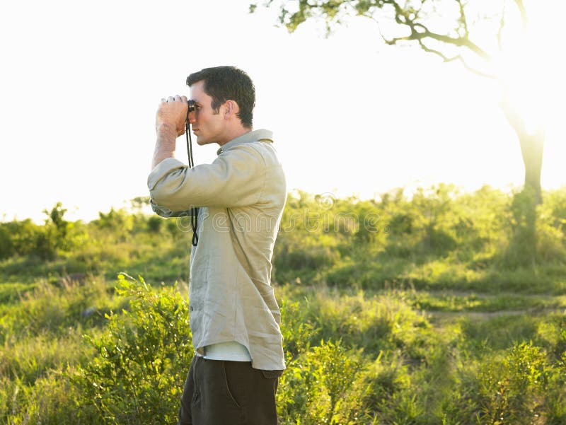 13,251 Man Looking Binoculars Stock Photos - Free & Royalty-Free Stock ...