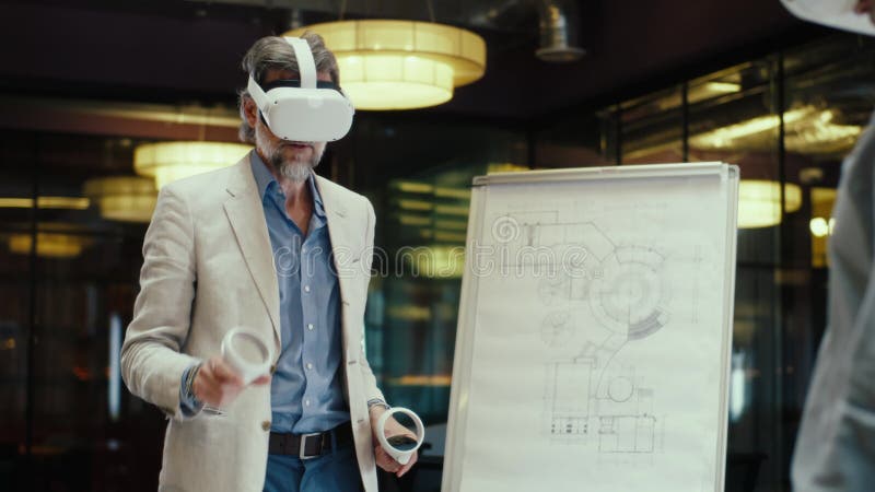 Man Looking at Blueprint in VR Headset Stock Footage - Video of discuss ...