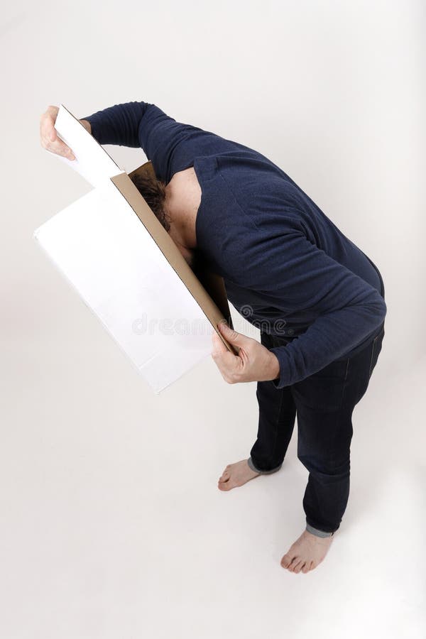 Man Looking into a Box on a White Background Stock Image - Image of ...