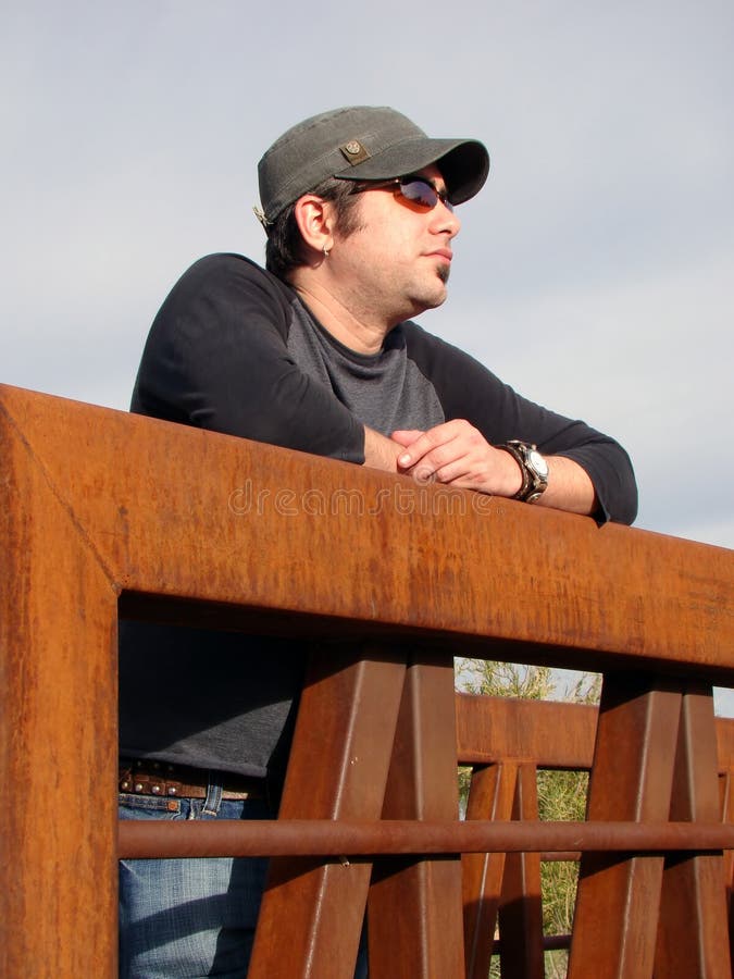 Man Looking from Bridge stock image. Image of alone, observing - 7370879