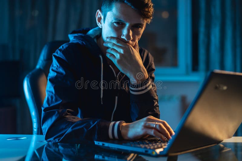 Man Looking In The Camera Hacker Attacks And Stealing Access Databases With Passwords Cyber