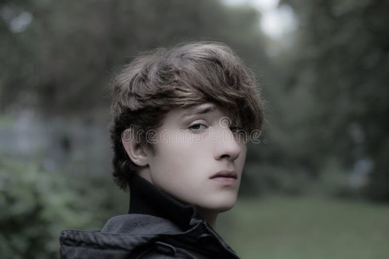 Man Looking at Camera Over Shoulder Stock Image - Image of camera, gaze ...