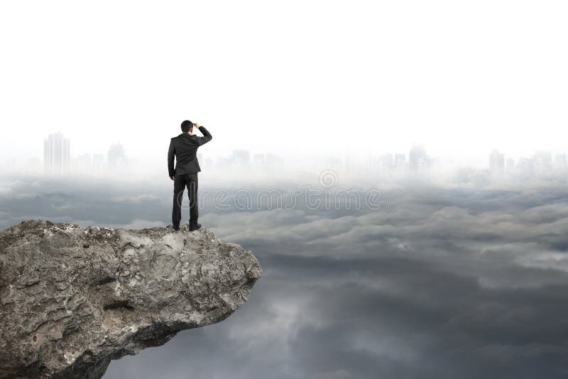 Man Looking on Cliff with Gray Cloudy Sky Cityscape Background Stock ...