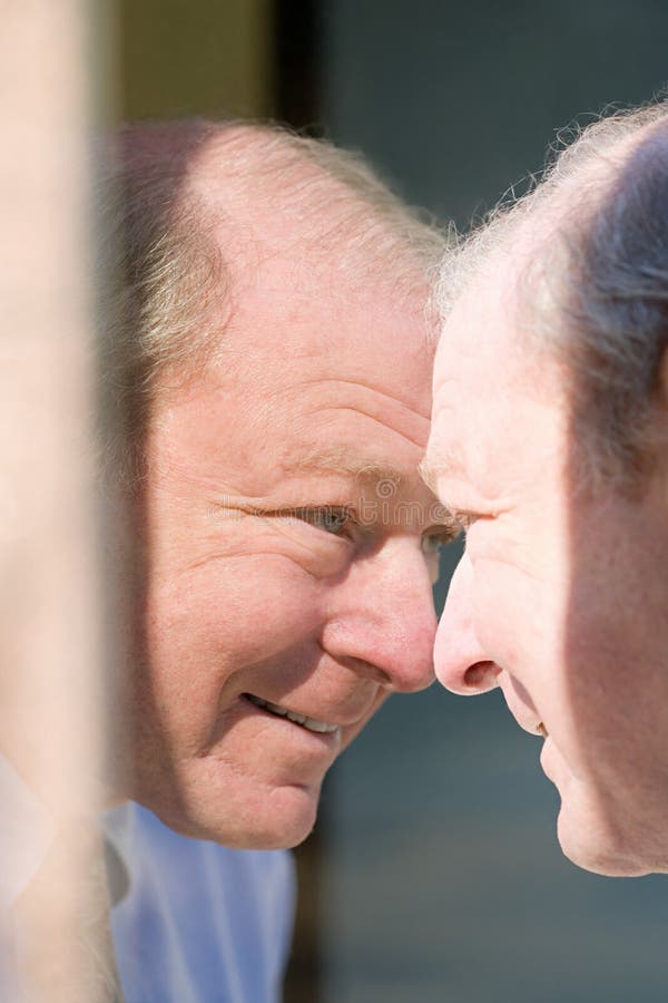 Man Looking Closely at Himself Stock Photo - Image of intensity ...