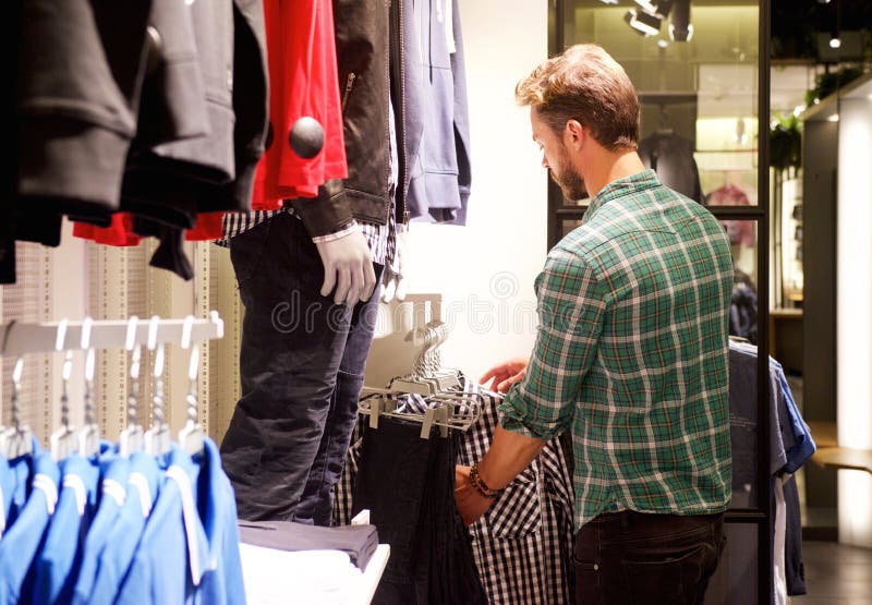 Man Looking at Clothes in a Store Stock Image - Image of elegant, beard ...