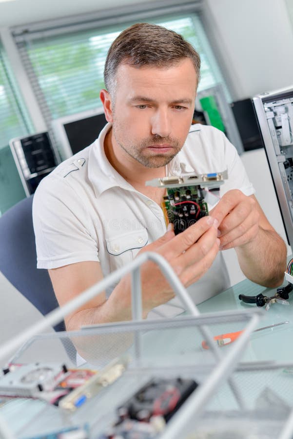 Man Looking at Computer Component Frustrated Expression Stock Image ...