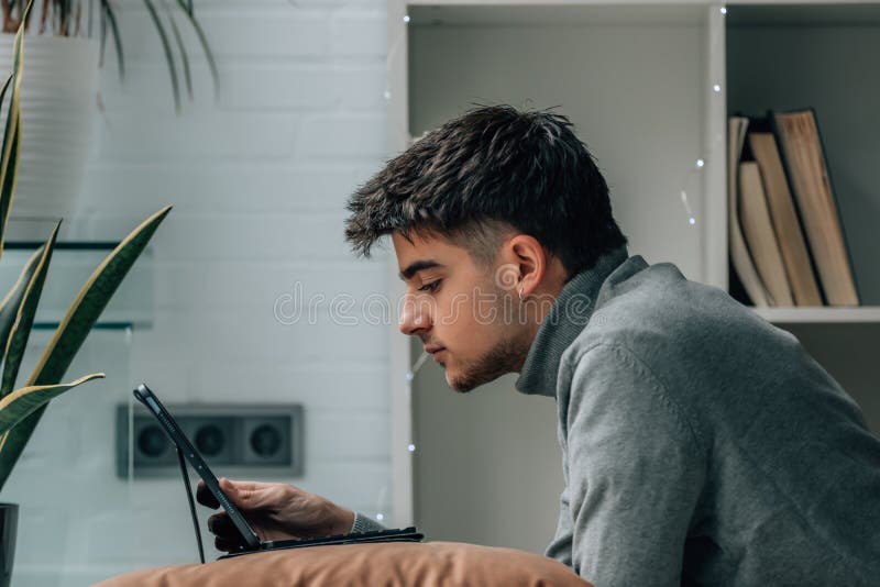 Man Looking at Computer or Laptop at Home Stock Photo - Image of data ...