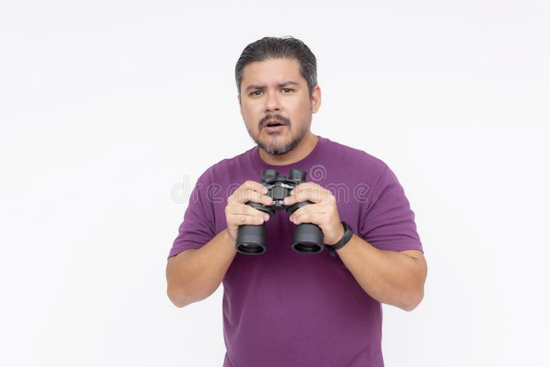 A Man Looking Confused upon Seeing Something Mysterious with His ...