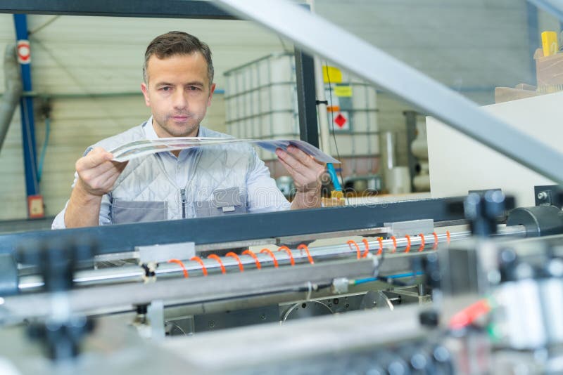 Man Looking at Copy from Professional Printing Works Stock Image ...