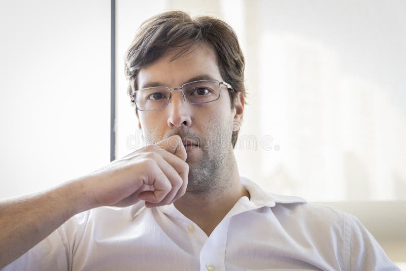 Man Looking Directly at the Camera Making a Conference Call Stock Image ...