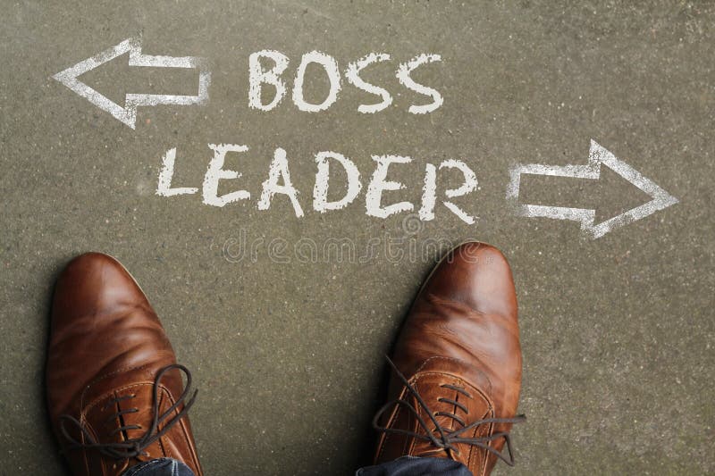 Man Looking Down at the Words "Boss" and "Leader" Stock Photo - Image ...