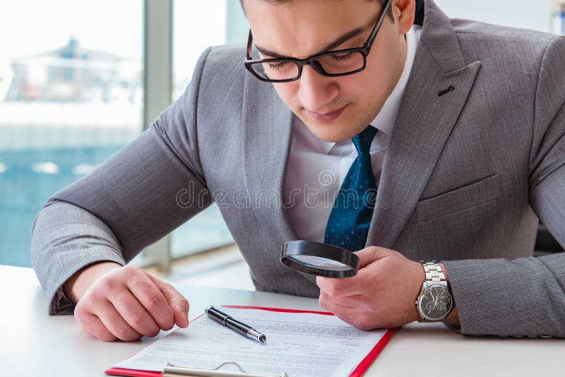 The Man Looking for Errors and Mistakes in Report Stock Photo - Image ...