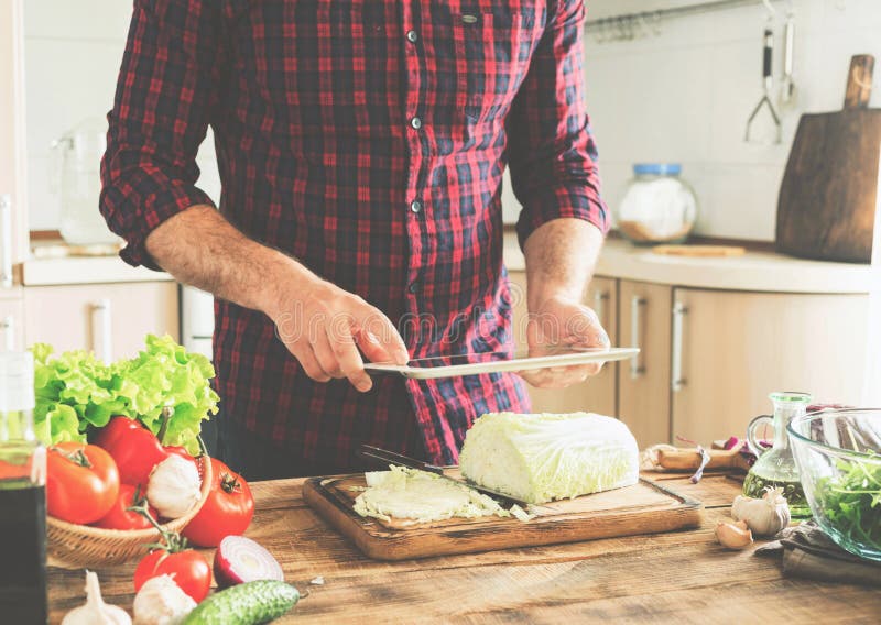 Man Looking Food Recipe in Tablet in the Kitchen Stock Photo - Image of ...