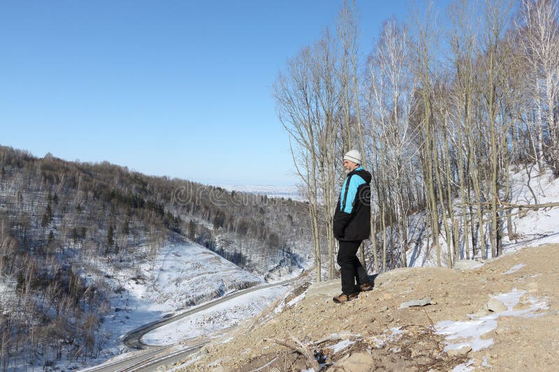 The Man Looking from the High Mountain at the Highway Stock Photo ...
