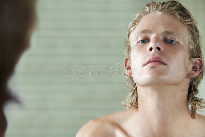 Man Looking Himself in Mirror Stock Photo - Image of looking, hair ...