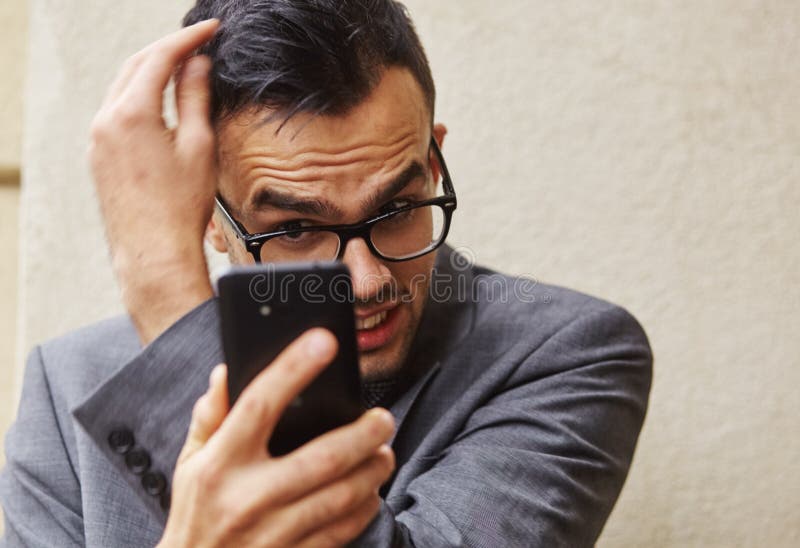Man Looking at Himself Using Camera Phone Stock Image - Image of self ...