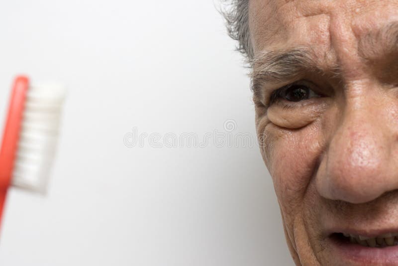 Man Looking at His Old Worn Our Toothbrush Stock Photo - Image of ...