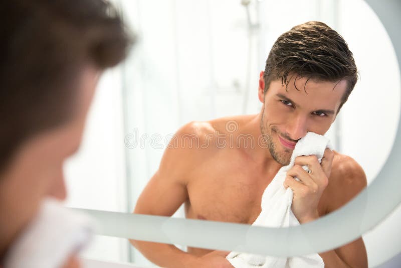 Man Looking at His Reflection in the Mirror Stock Image - Image of care ...