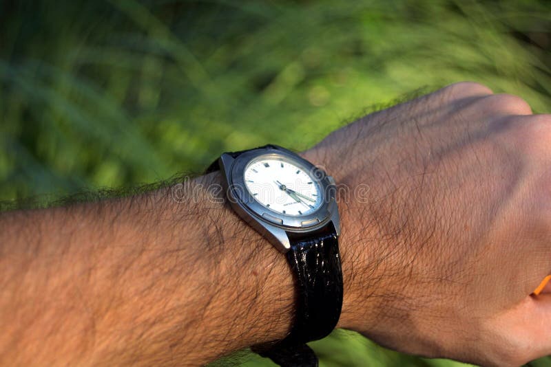 Man looking at his watch stock photo. Image of late, watch - 7787504