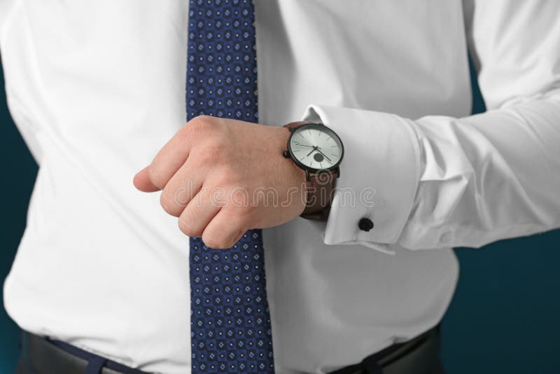 Man Looking at His Watch, Closeup. Time Management Concept Stock Photo ...