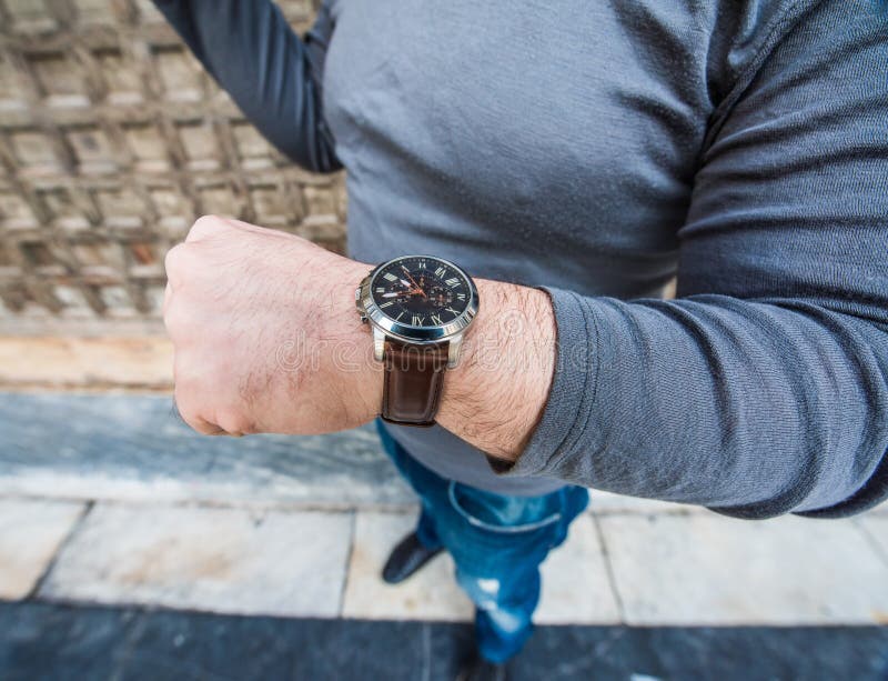 Man Looking at His Watch - Detailed View Stock Image - Image of ...