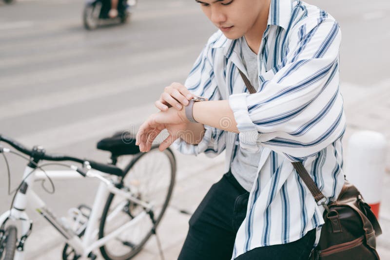 Man Looking at His Watch while Waiting Stock Photo - Image of afro ...
