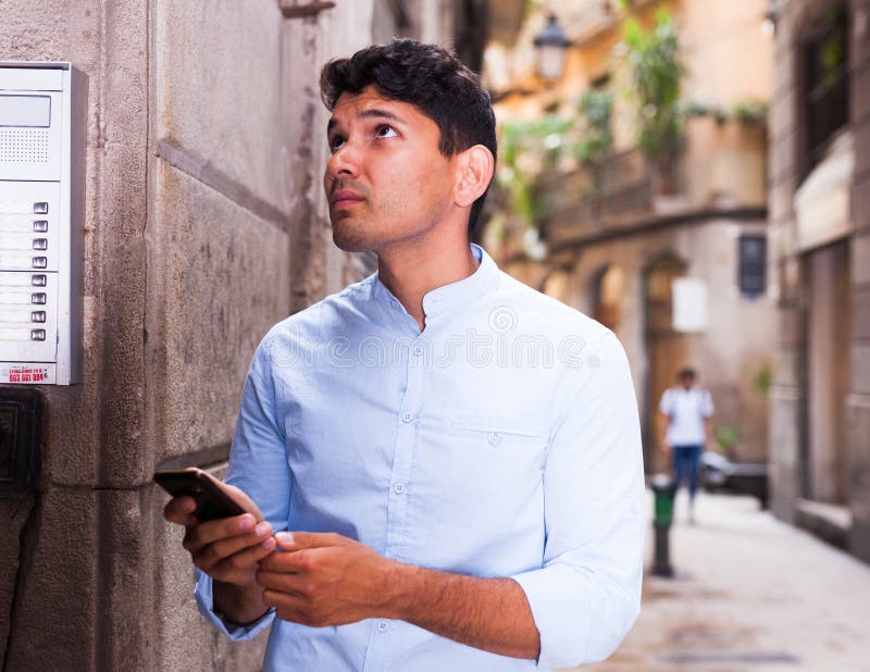 Man Looking for House at the Right Address in City Stock Photo - Image ...
